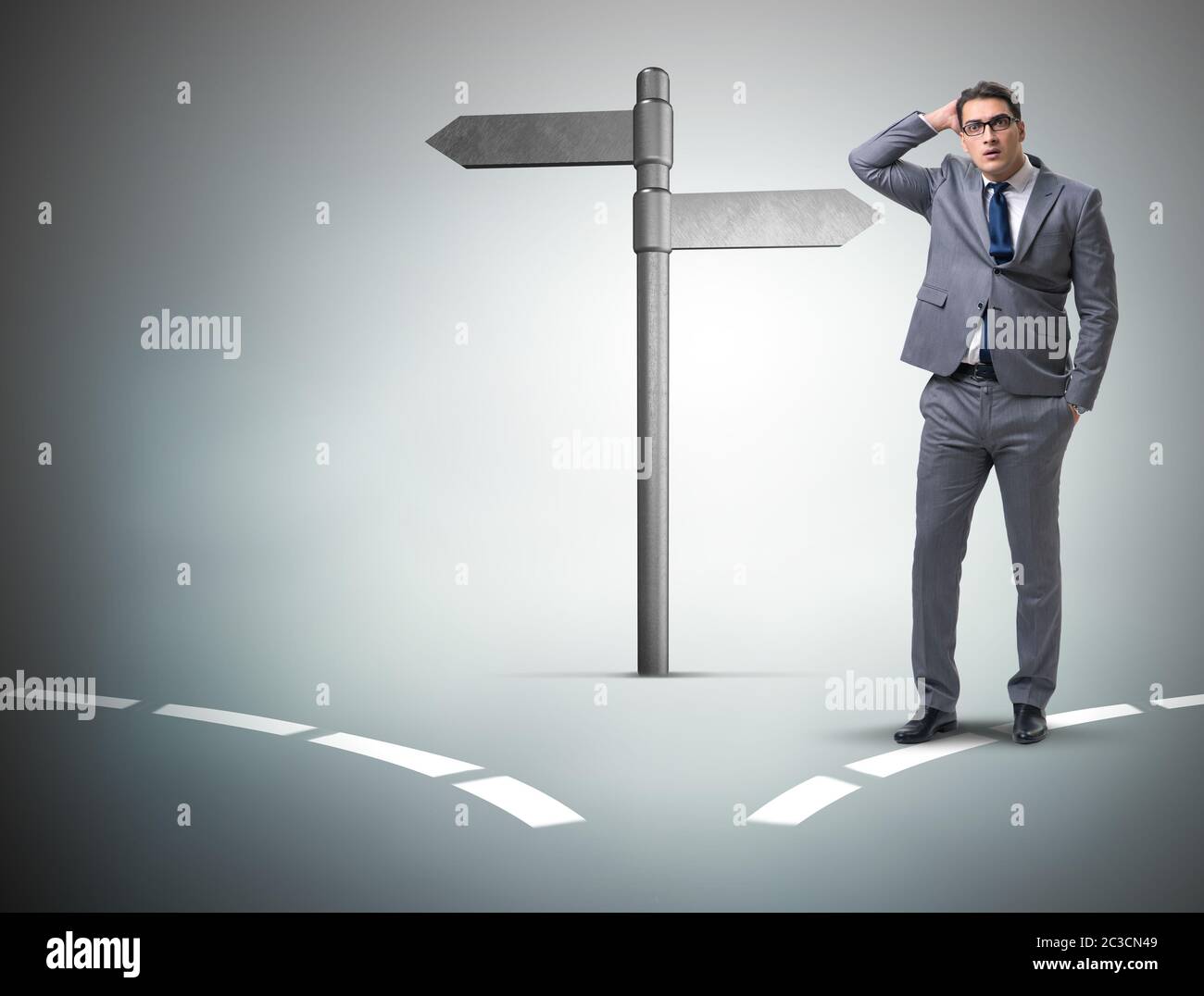 Businessman in difficult choice concept Stock Photo - Alamy
