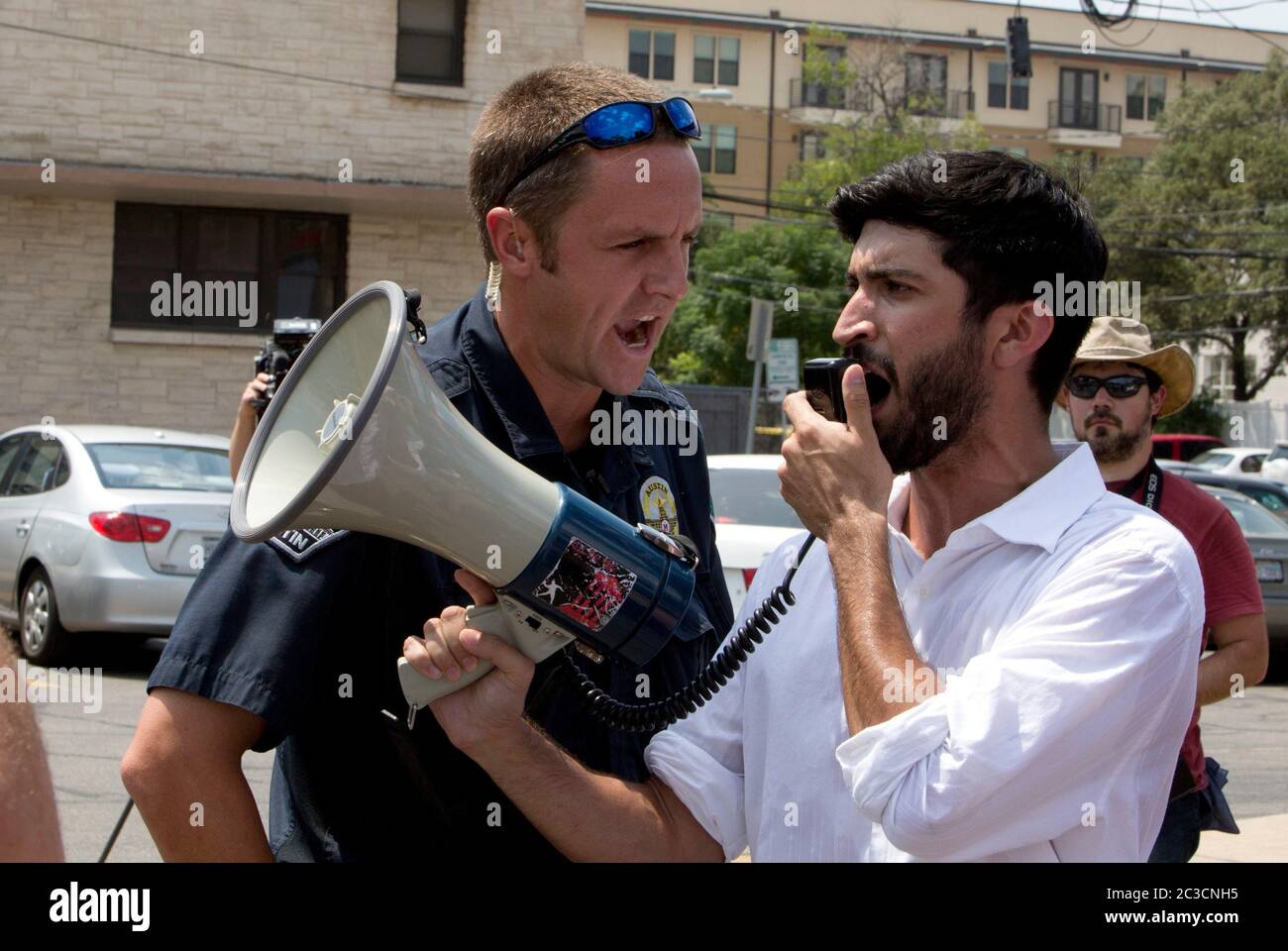 Police shouting hi-res stock photography and images - Alamy