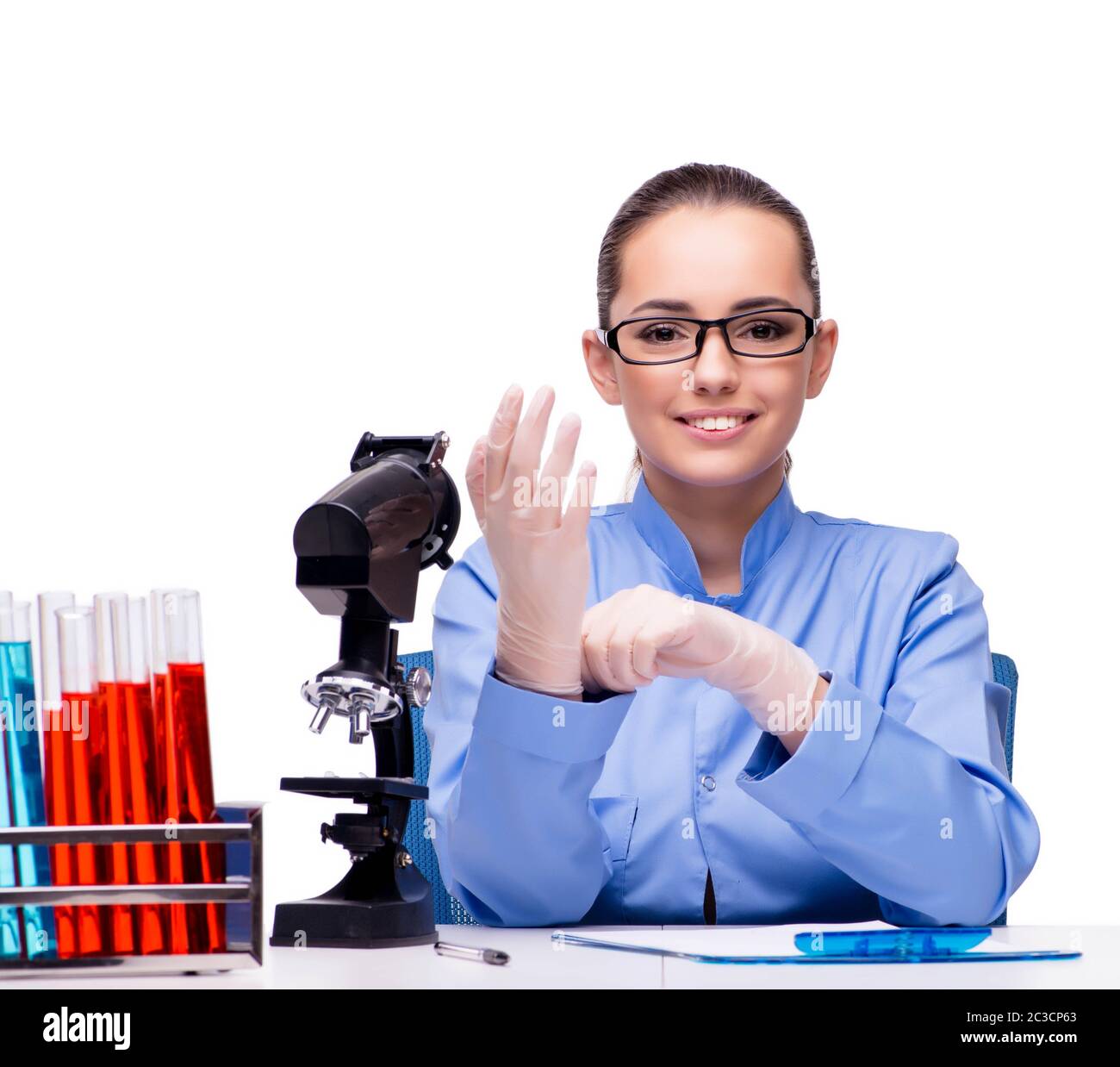 Lab chemist working with microscope and tubes Stock Photo - Alamy