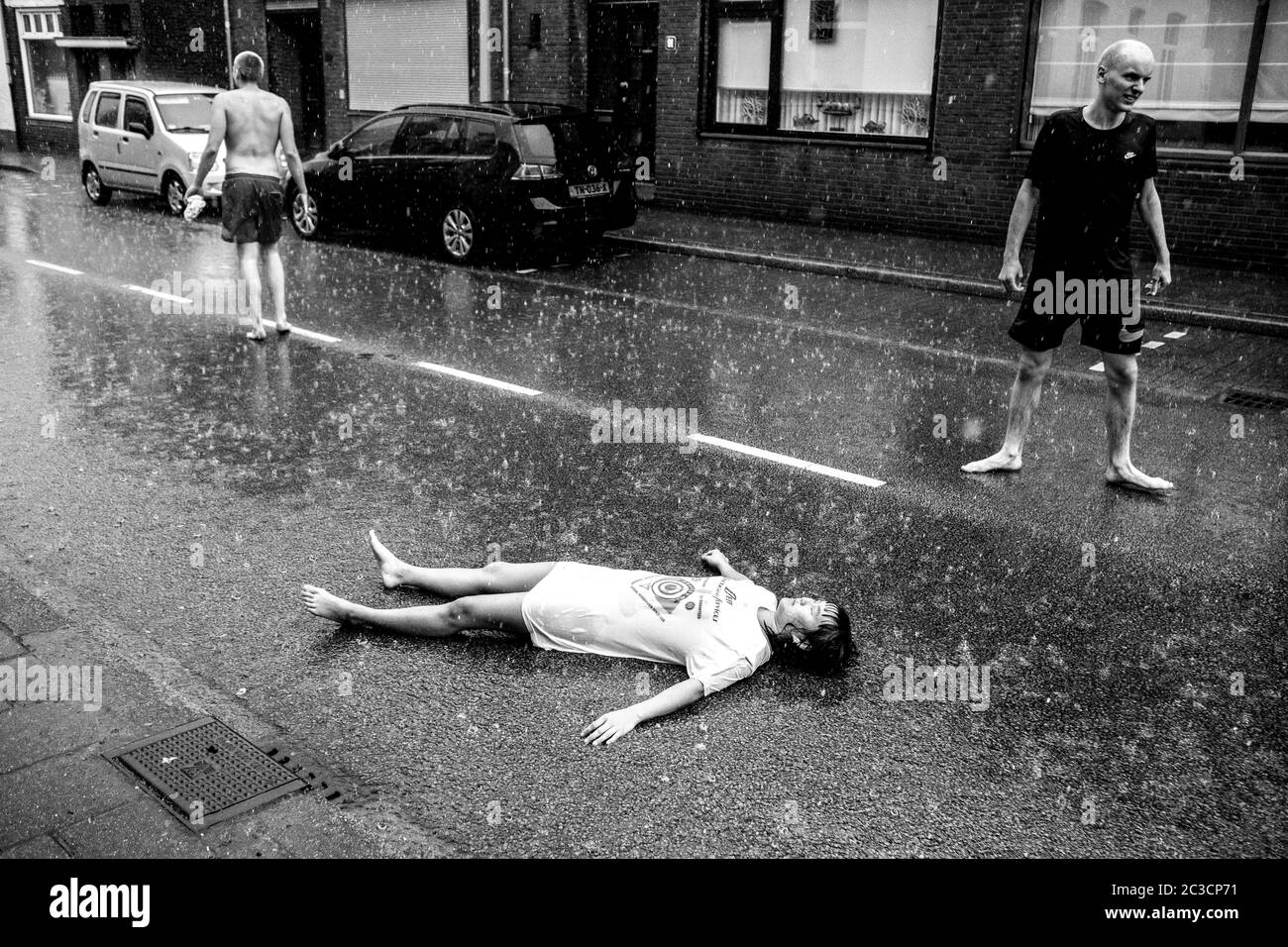 Enjoying the rain Black and White Stock Photos & Images - Alamy