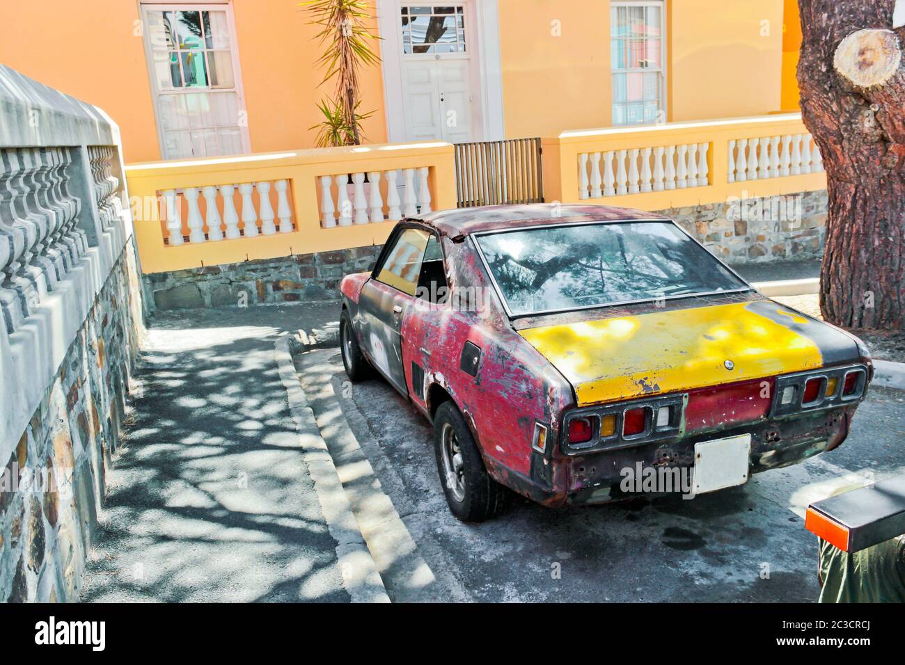 Old dirty rusted car from behind, Bo-Kaap district, Cape Town, South ...