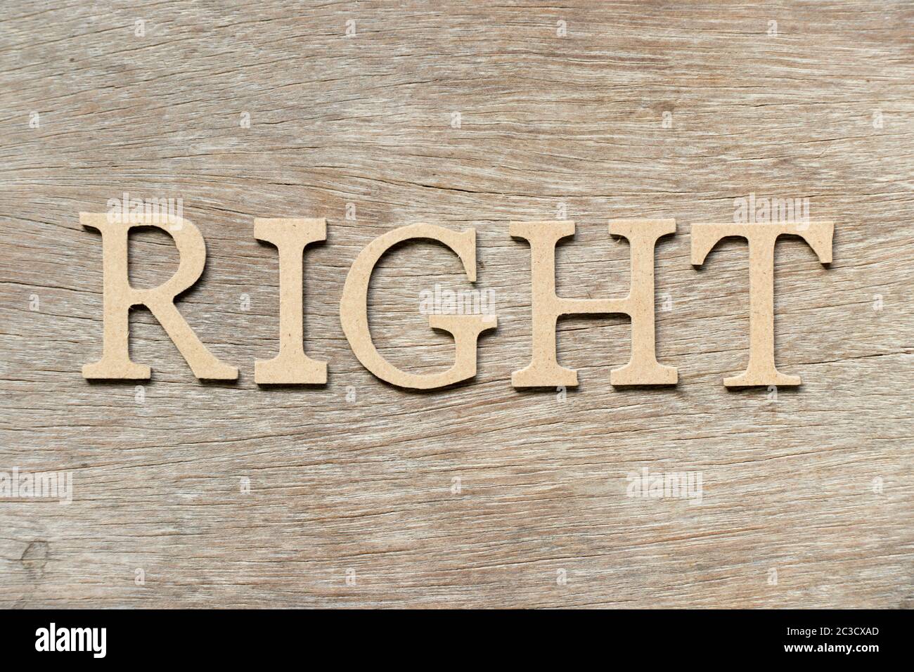 Alphabet letter in word right on wood background Stock Photo - Alamy