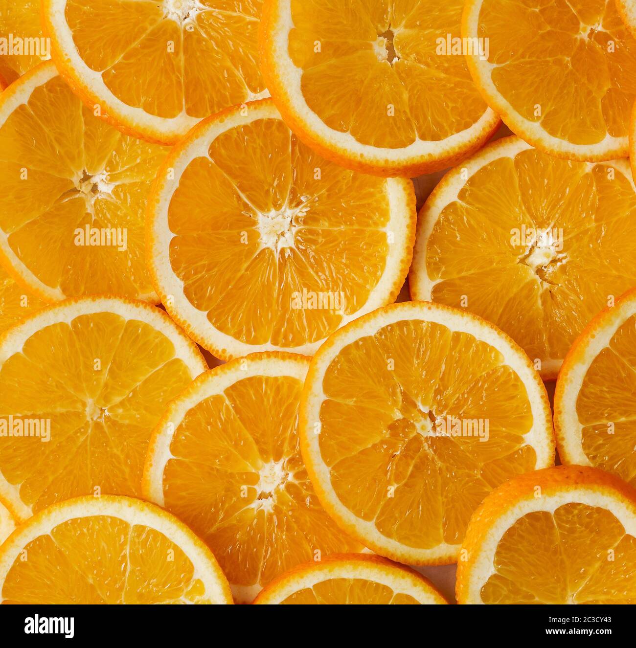 texture of round slices of ripe juicy orange. Organic food frame ...