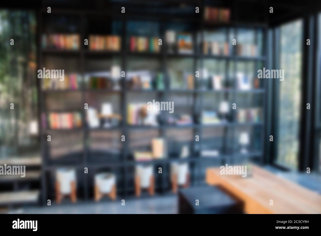 Blur book shelf in the living room Stock Photo - Alamy