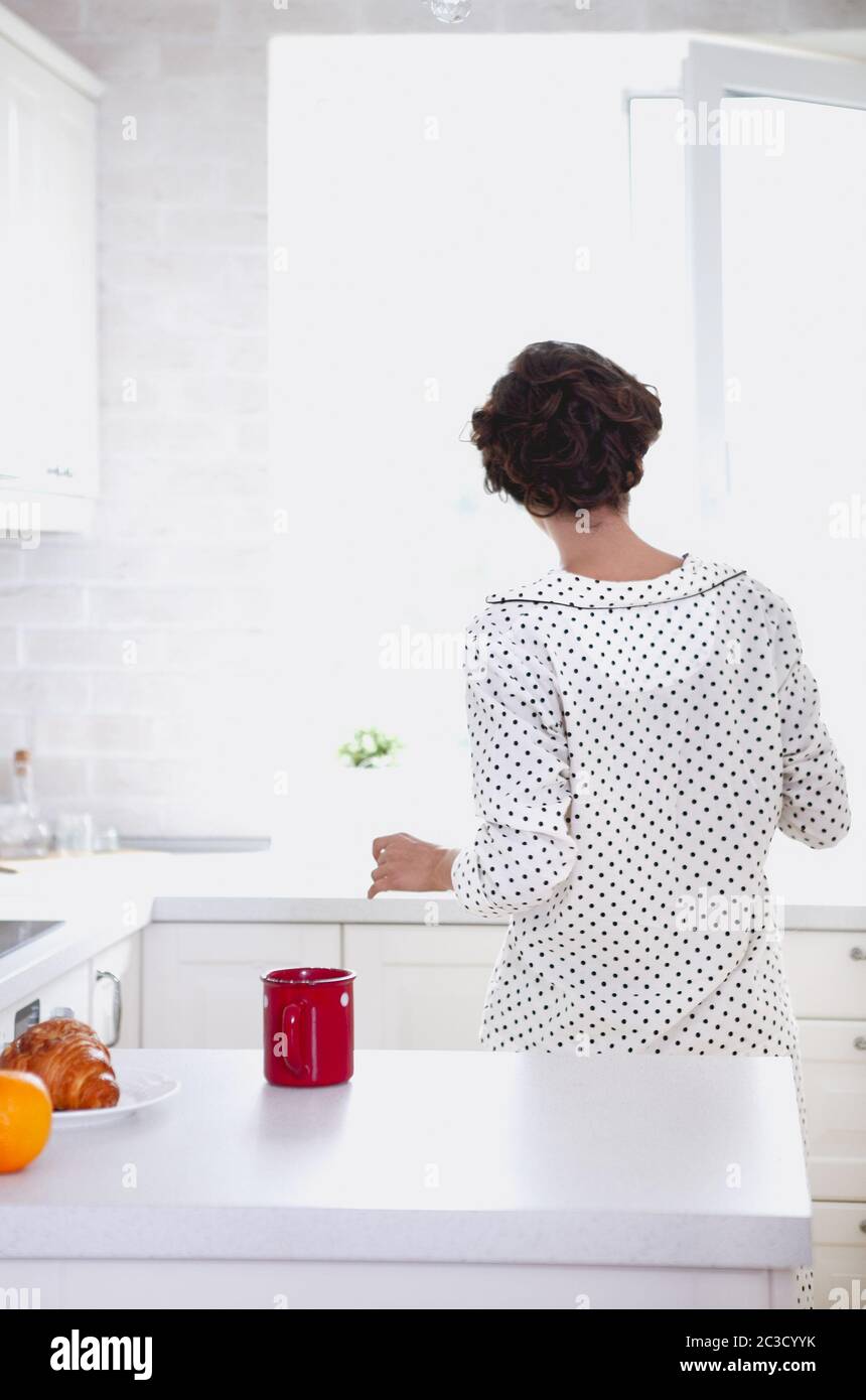Modern woman kitchen table hi-res stock photography and images - Alamy