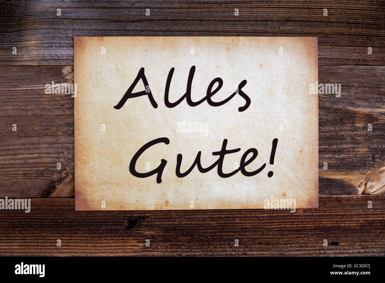 Old Grungy Paper With German Text Alles Gute Means Best Wishes. Wooden ...