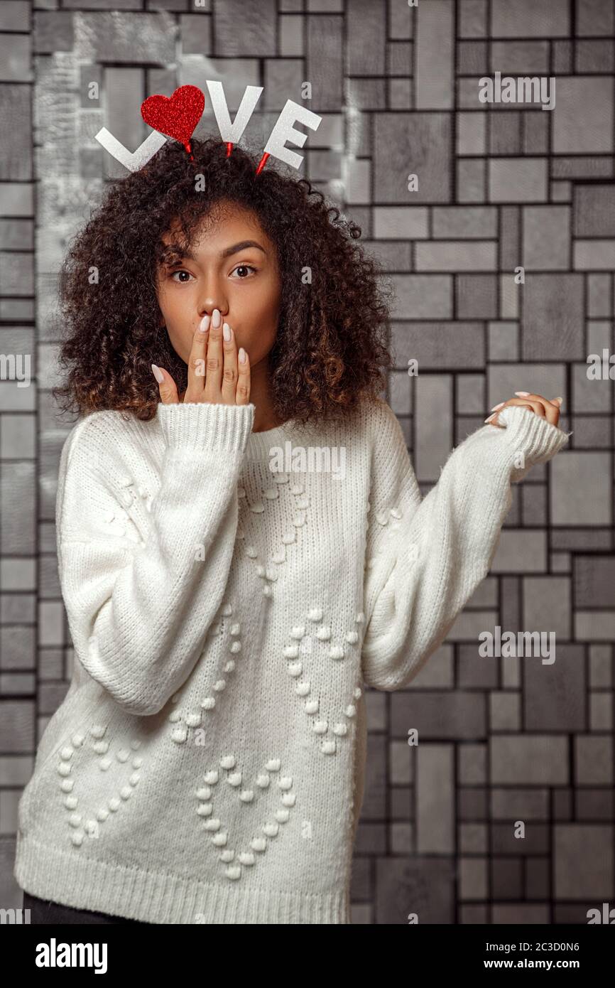 Close Up Portrait Of A Young Curly Haired African American Girl In A