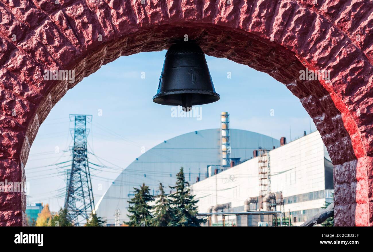 church bell on the background of the nuclear power plant in Chernobyl ...