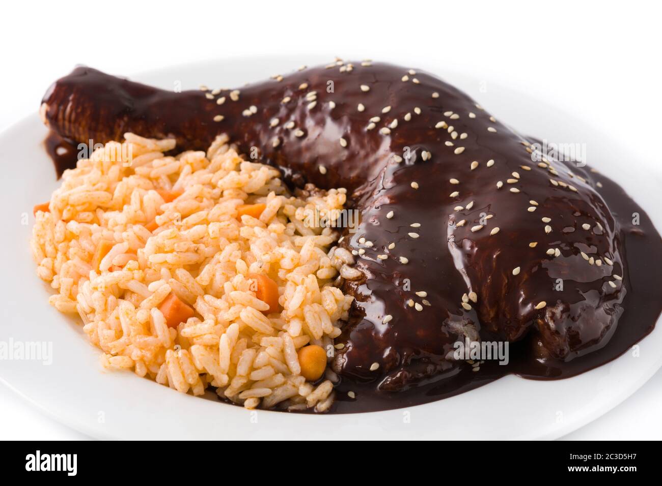Traditional mole Poblano with rice plate isolated on white background ...