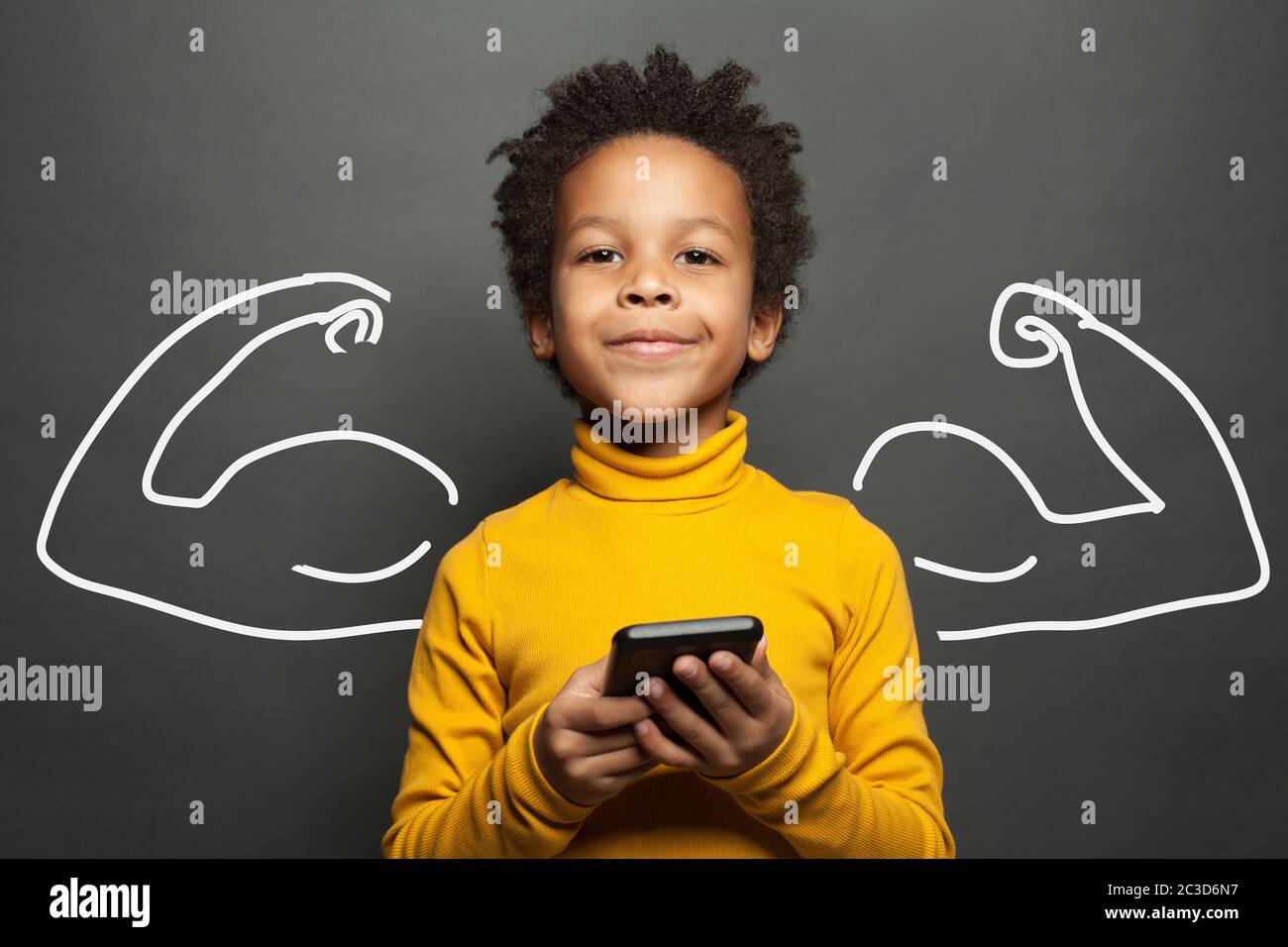 Happy black child using smartphone Stock Photo - Alamy