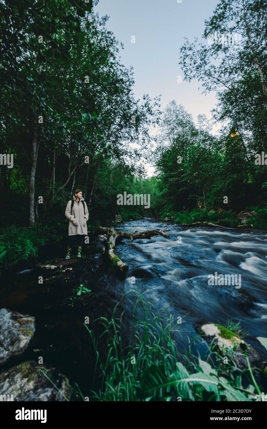 Woman wading in river hi-res stock photography and images - Alamy