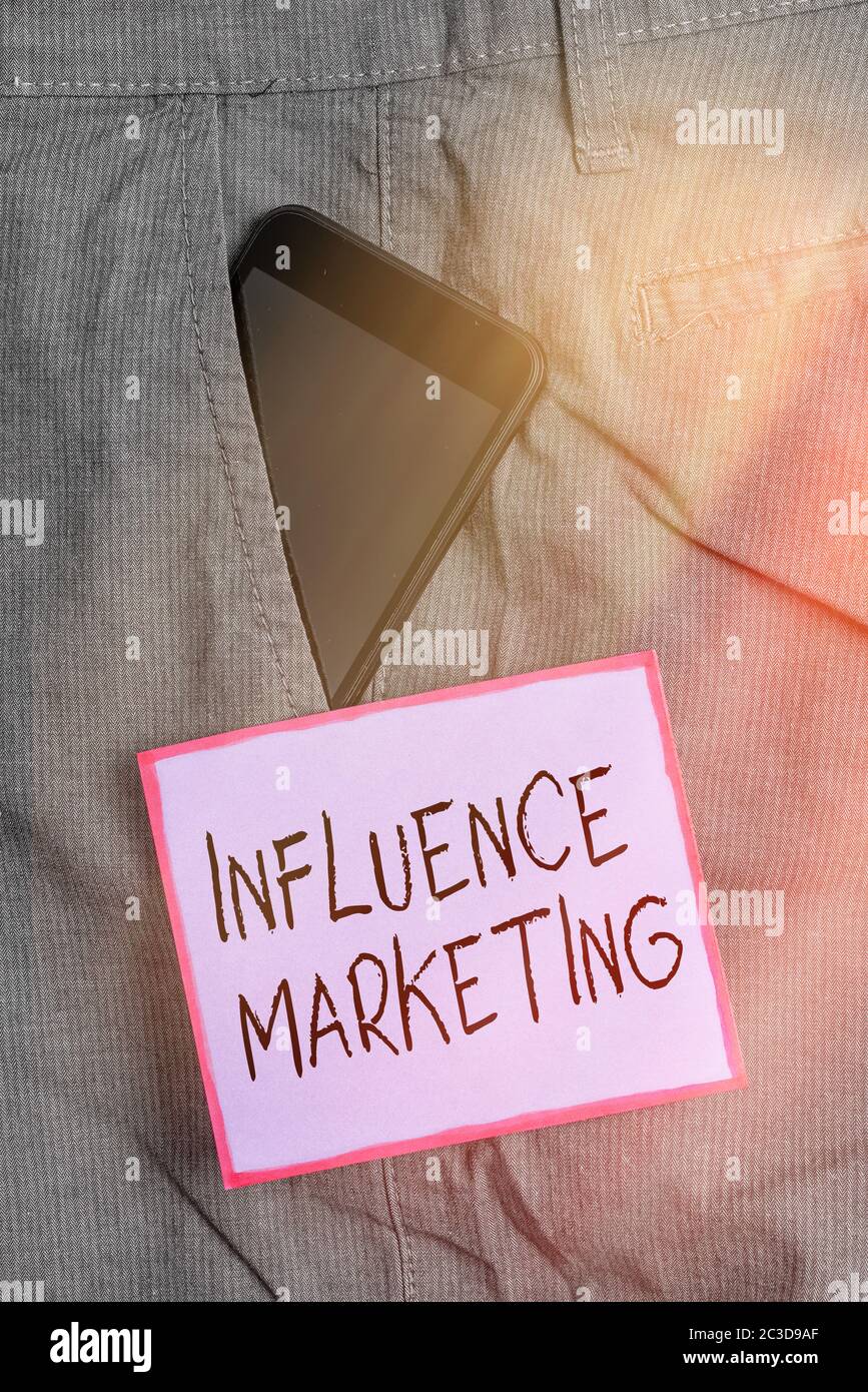 Text sign showing Influence Marketing. Business photo showcasing form ...