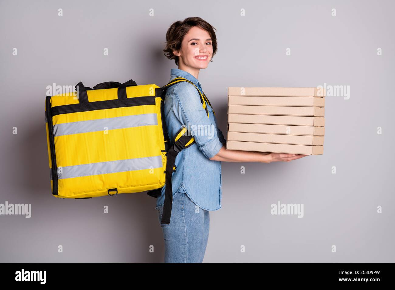 Thank you for order. Photo of cheerful lady hold stack pizza boxes ...
