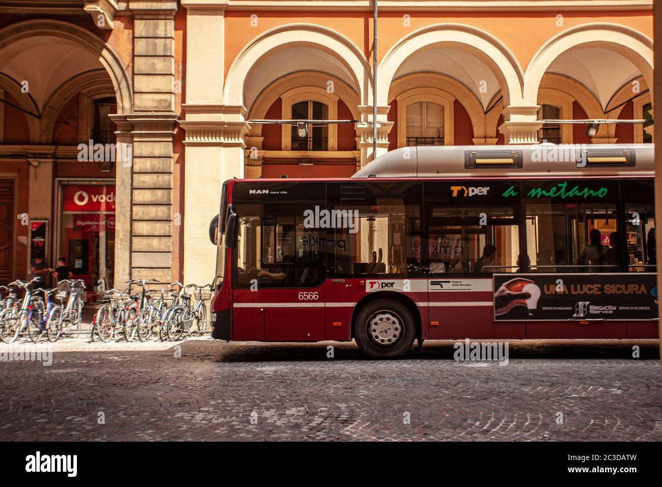 Bus in Bologna's street Stock Photo - Alamy