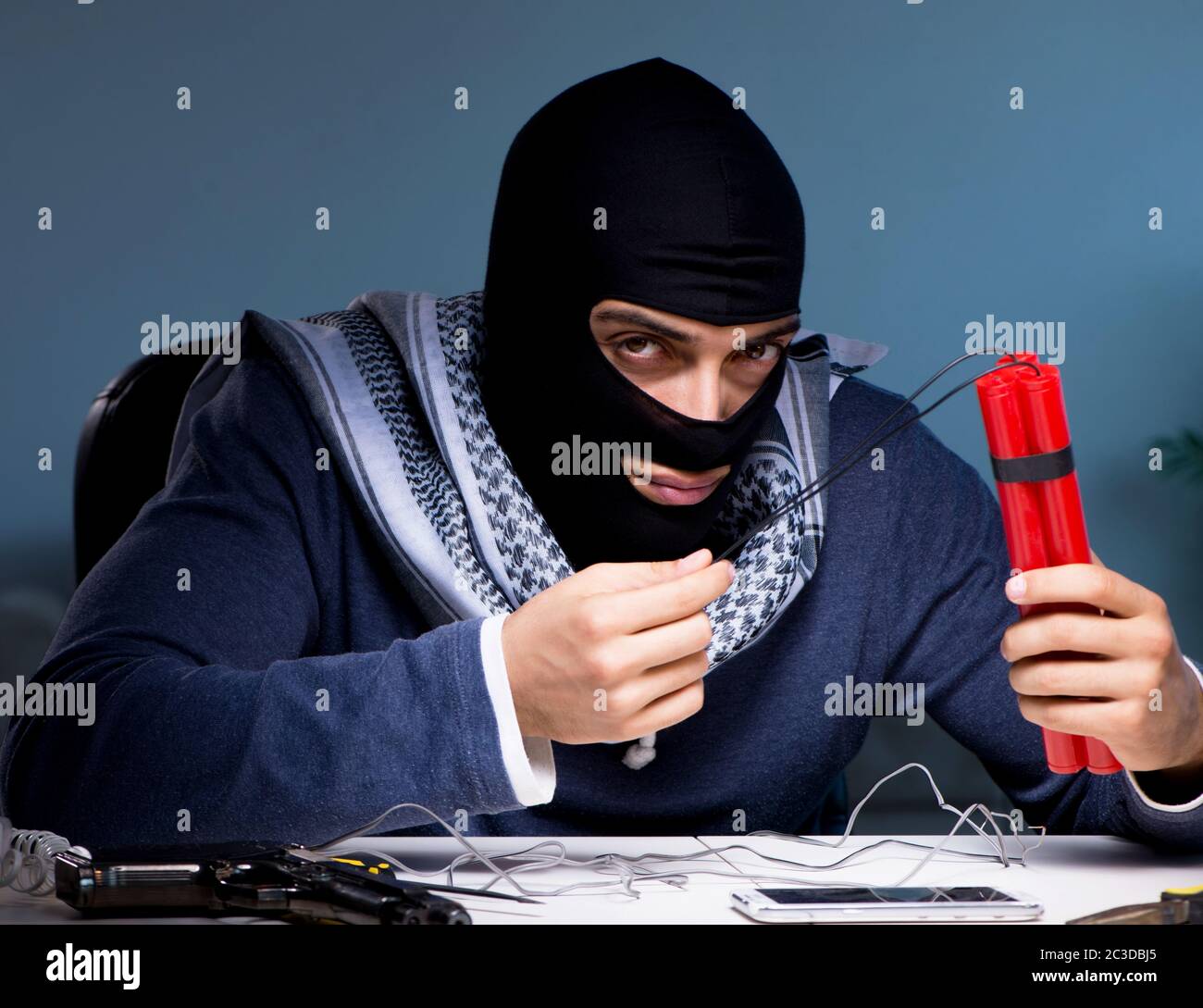 Terrorist bomber preparing dynamite bomb Stock Photo - Alamy