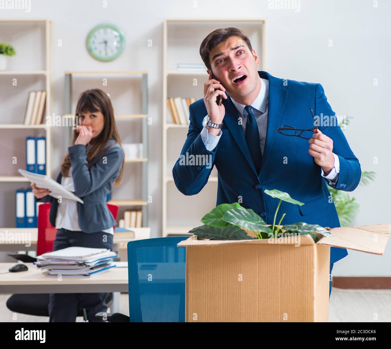 Person being fired from his work Stock Photo - Alamy