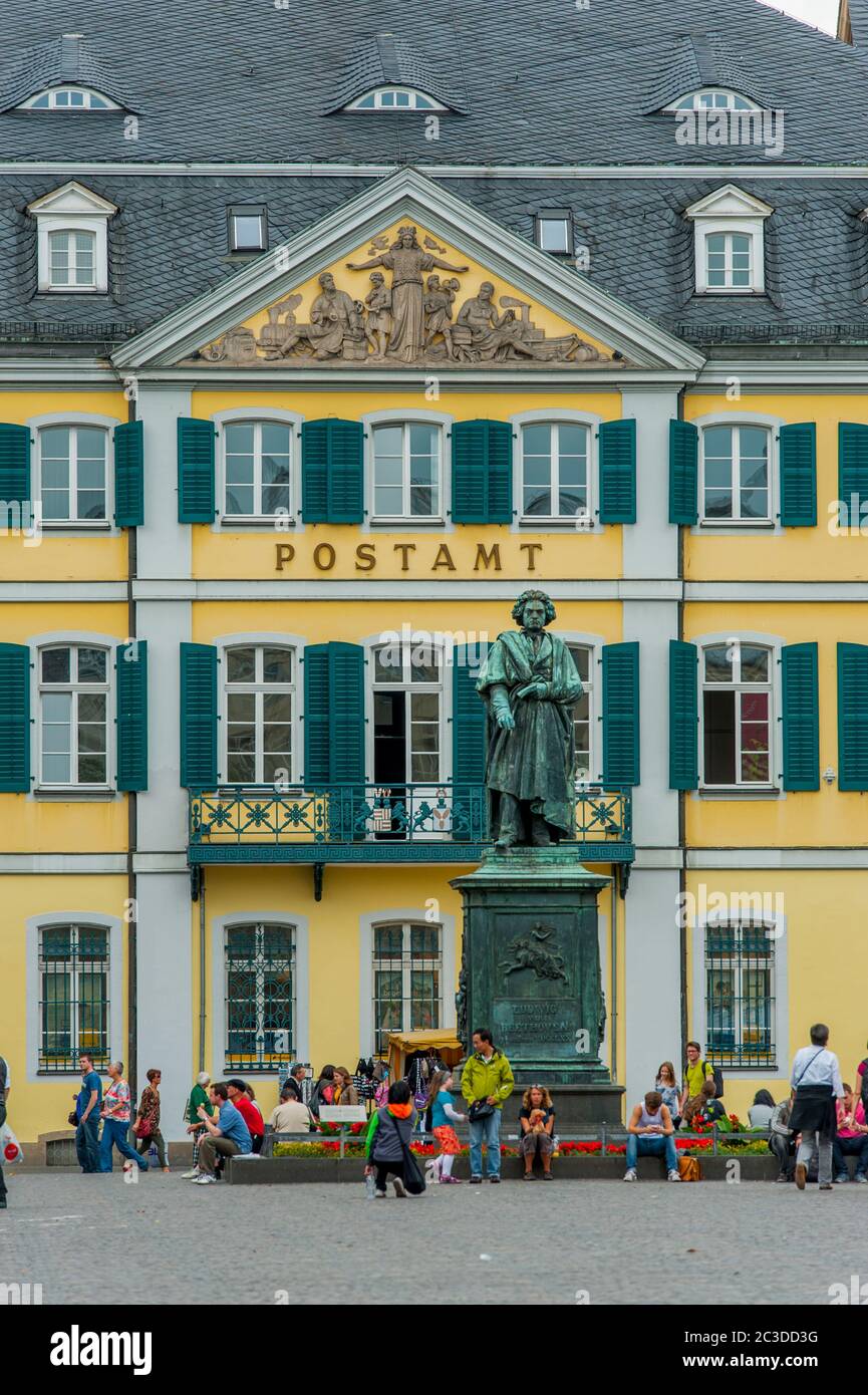 A statue of Ludwig van Beethoven standing on the Bonn Minster Square in ...