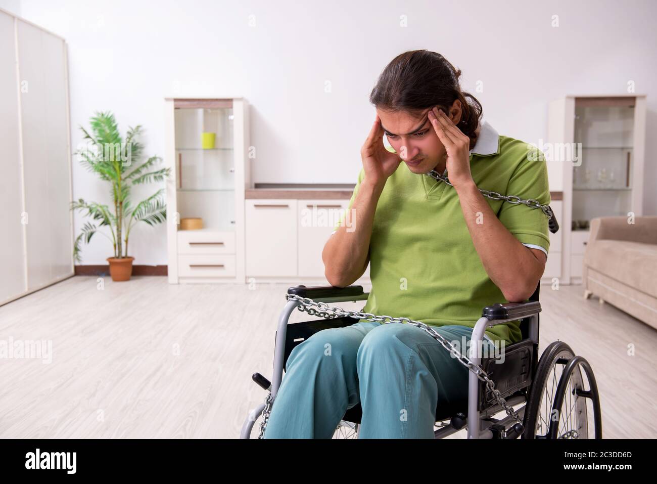 Restrained wheelchair hi-res stock photography and images - Alamy