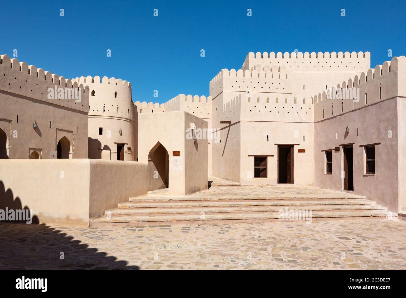 Patio of fort of Bani bu Hassan, Oman, with its typical beige clay ...