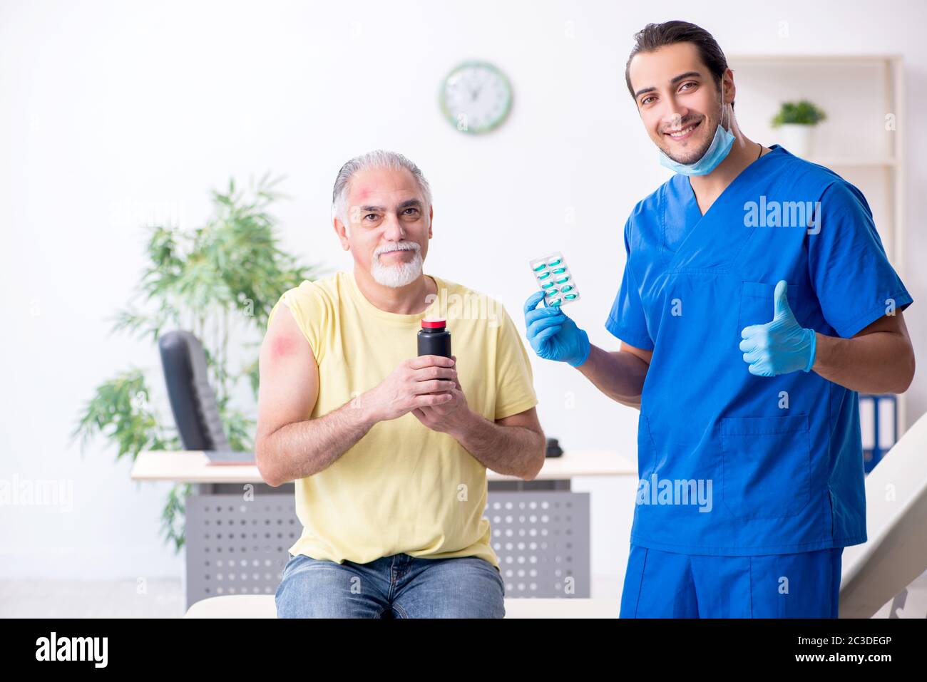 Man giving thumbs up arm hi-res stock photography and images - Alamy