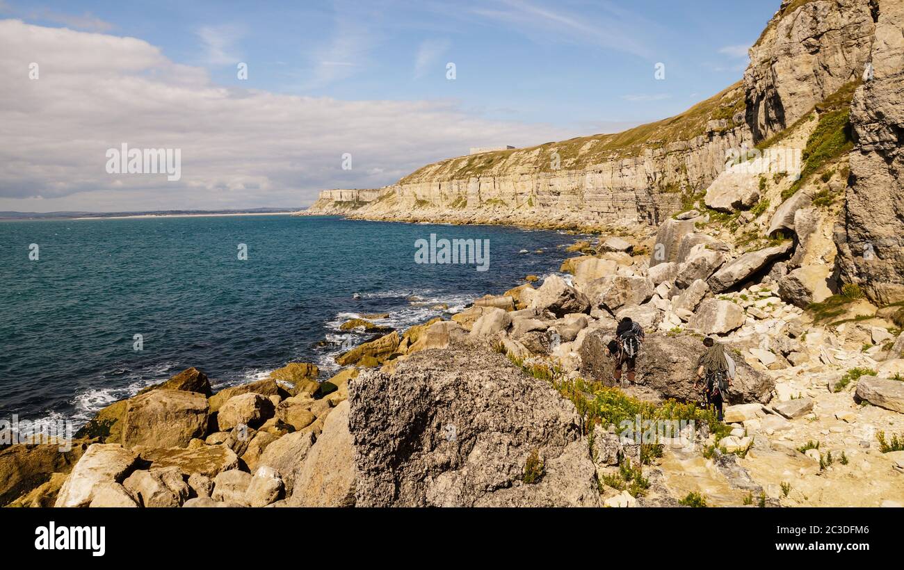 Climbing at the cliffs of the Isle of Portland in Dorset, England ...