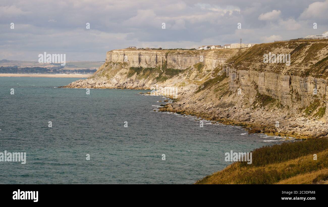 Climbing at the cliffs of the Isle of Portland in Dorset, England ...