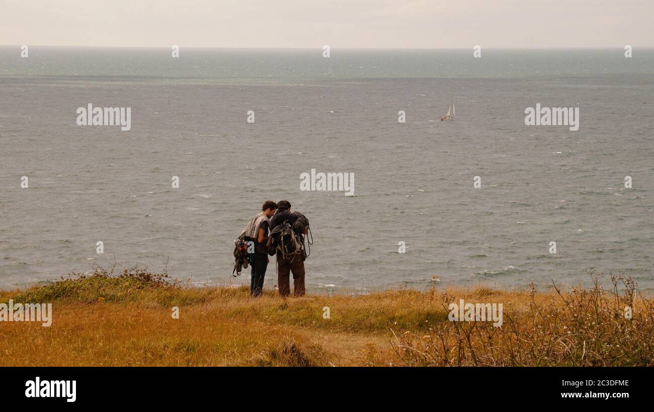 Climbing at the cliffs of the Isle of Portland in Dorset, England ...
