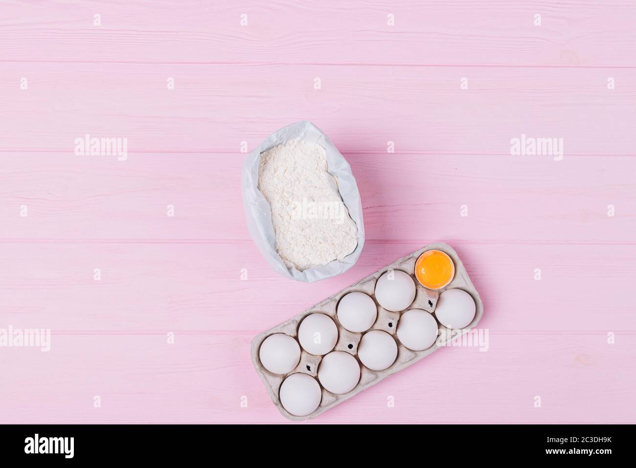 Ingredients for homemade baking pack of fresh eggs and bag of wheat ...