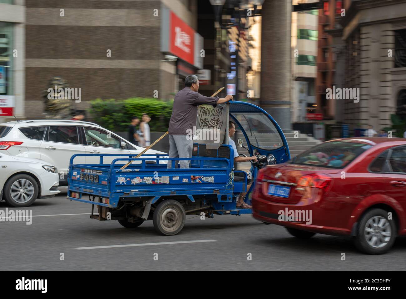 Mad traffic on busy street in Chongqing Stock Photo - Alamy