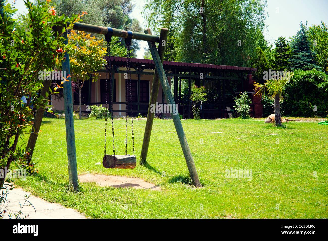 Beautiful boy swinging on swing hi-res stock photography and images - Alamy