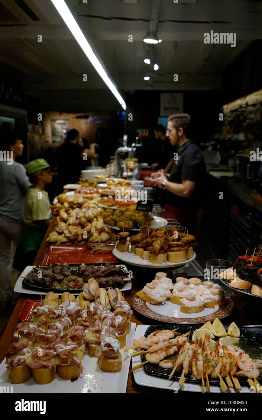 Interior view of a Pincho bar restaurant with differentl types of ...