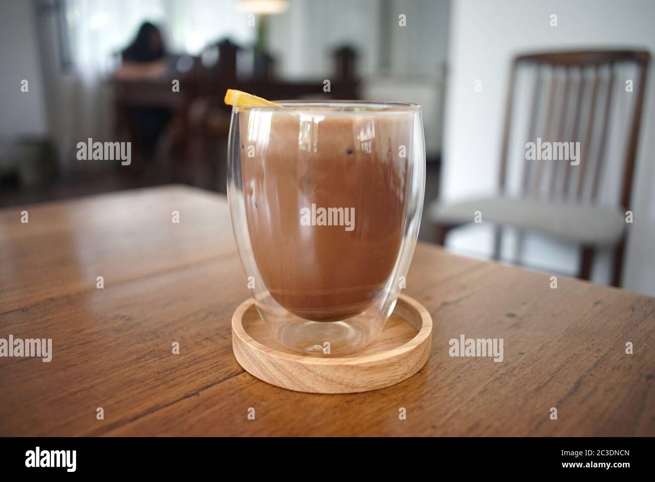 Iced chocolate in a glass at coffee shop Stock Photo - Alamy