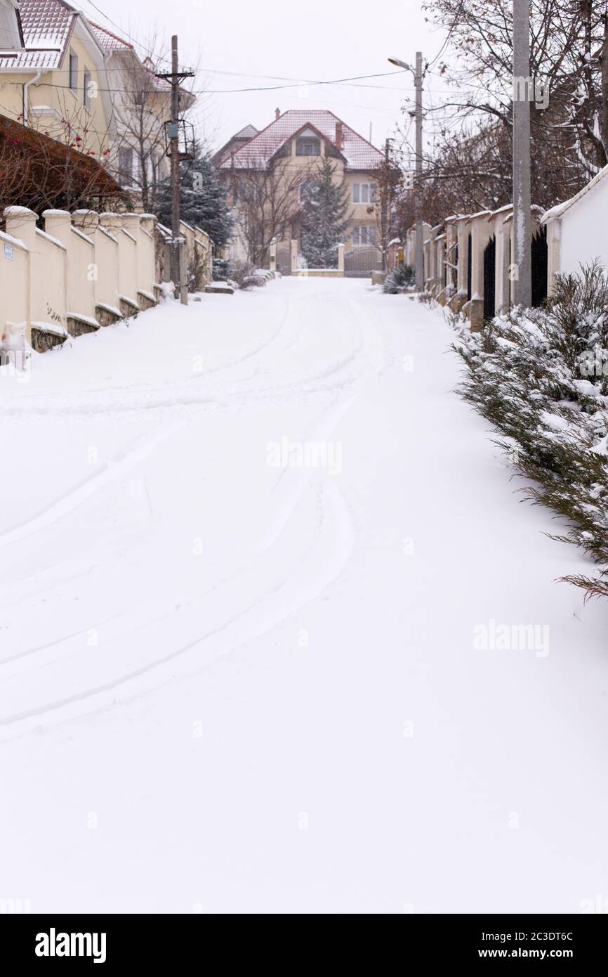 Beautiful winter street. Snow covered everything on the street Stock ...