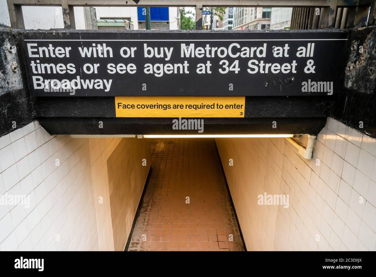 Social distancing and face covering signage at the 34th Street-Herald ...