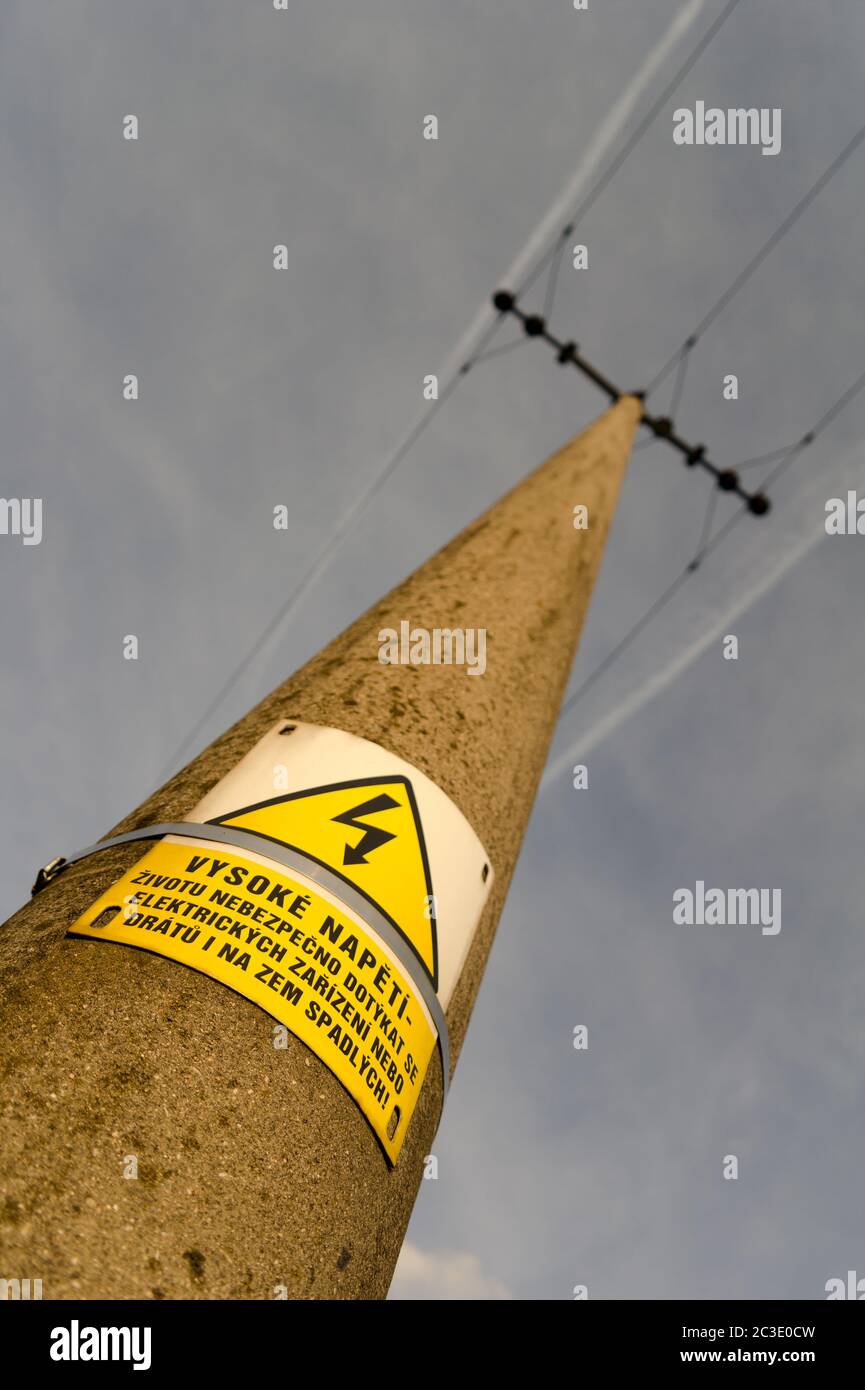 Electric pole with notice - Vysoke napeti (High Voltage) warning sign ...