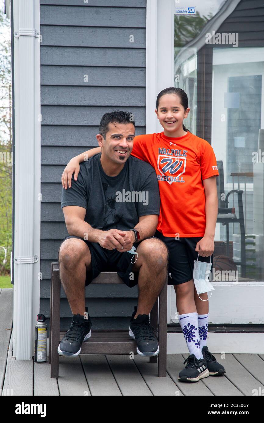 Puerto Rican graphic designer David Torres and his two children at home ...