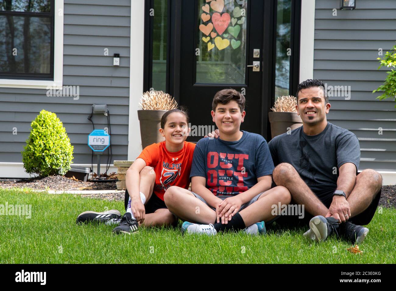 Puerto Rican graphic designer David Torres and his two children at home ...