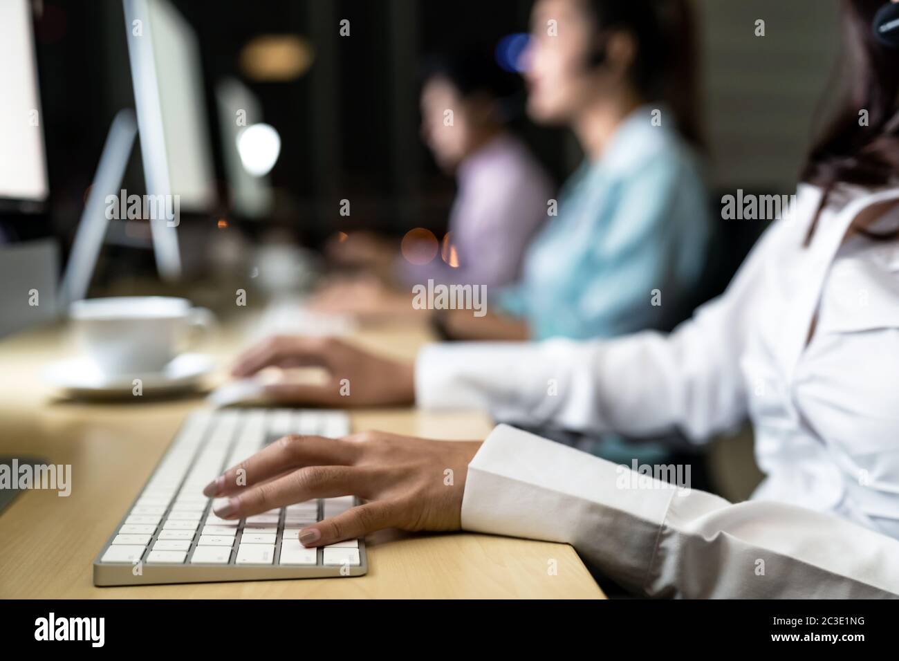 Call Center working at night Stock Photo - Alamy