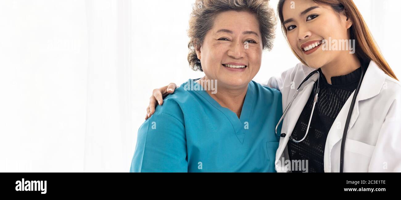 doctor hugging elderly patient Stock Photo - Alamy