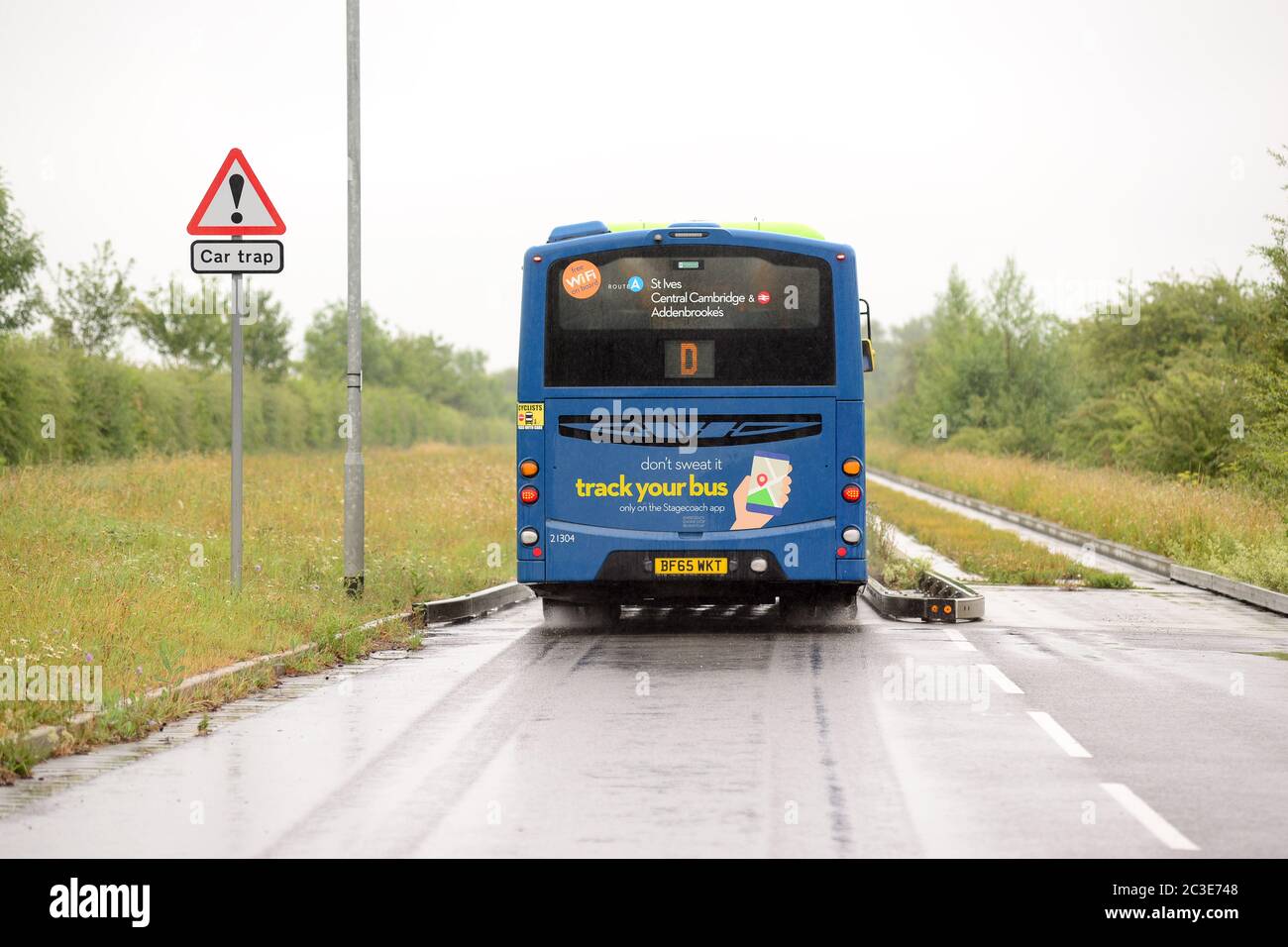 Cambridge, uk 18-06-2020. Public bus pulling away from bus stop to pick ...