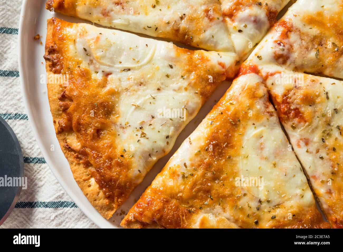 Cheesy Homemade Cheese PIzza Sliced and Ready to Eat Stock Photo - Alamy