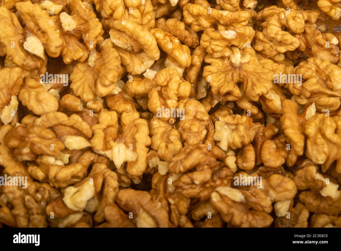 Peeled walnuts loose surface texture. Healthy diet. Fitness diet. Close ...