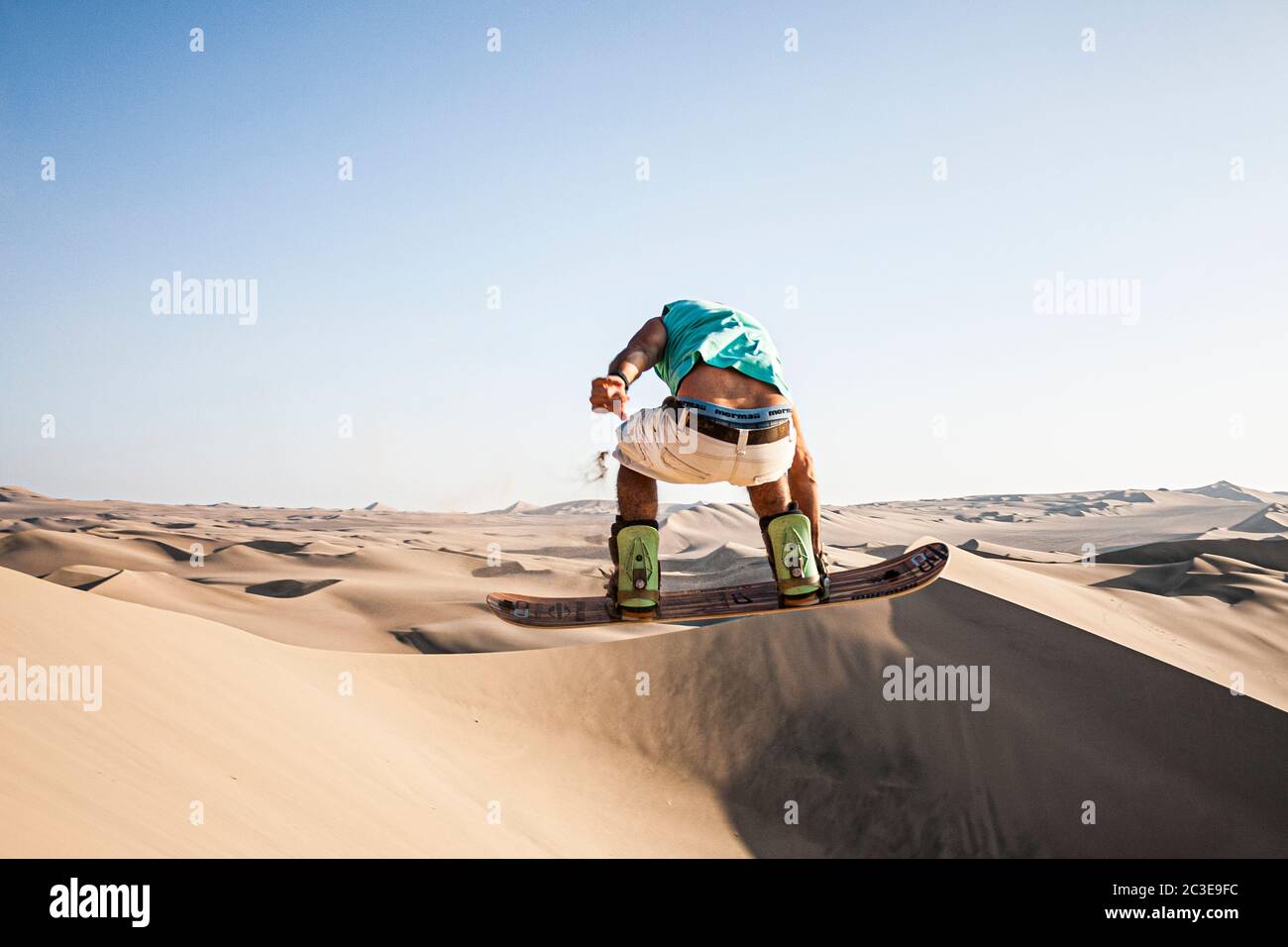 Sandboarding on Huacachina Desert. Ica, Ica Region, Peru Stock Photo ...