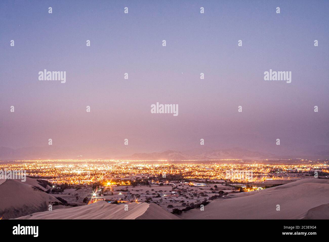 City of Ica viewed from Huacachina at night. Ica, Department of Ica ...