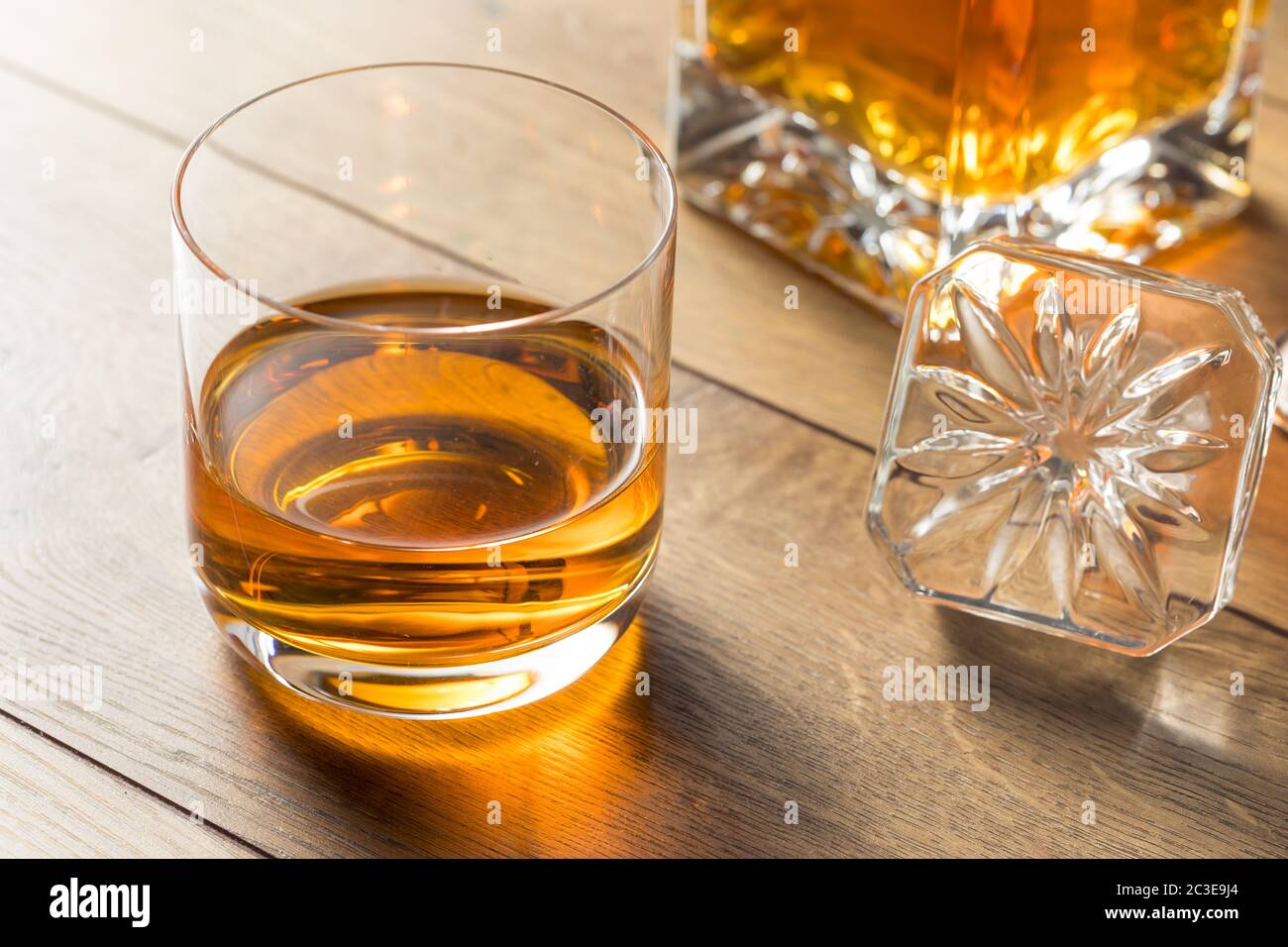 Boozy Alcoholic Whiskey Neat in a Rocks Glass Stock Photo - Alamy