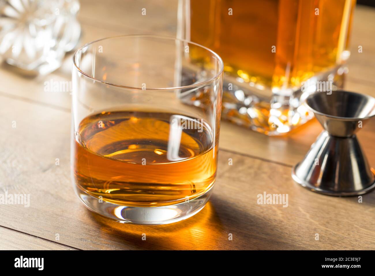 Boozy Alcoholic Whiskey Neat in a Rocks Glass Stock Photo - Alamy