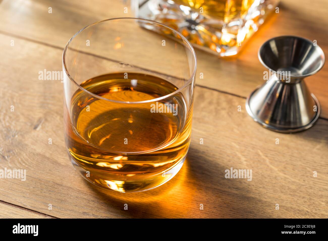 Boozy Alcoholic Whiskey Neat in a Rocks Glass Stock Photo - Alamy