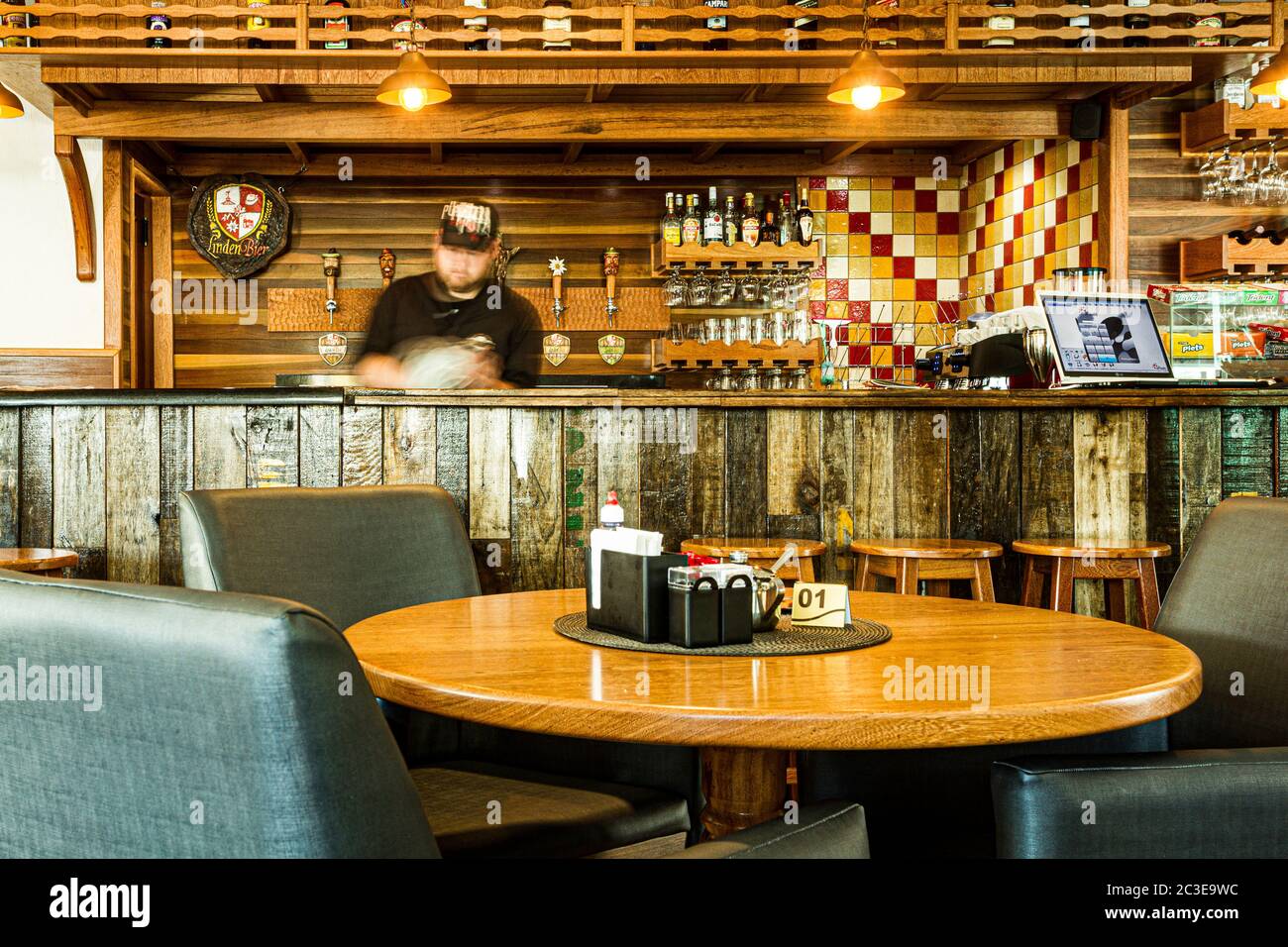 Bartender behind bar counter hi-res stock photography and images - Alamy