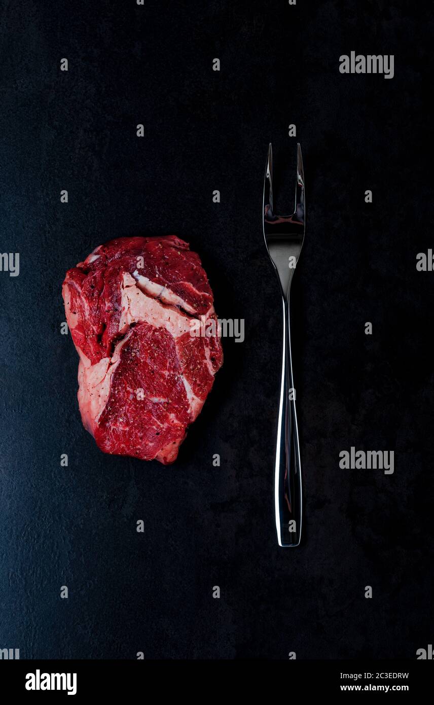 steak and fork top view Stock Photo - Alamy