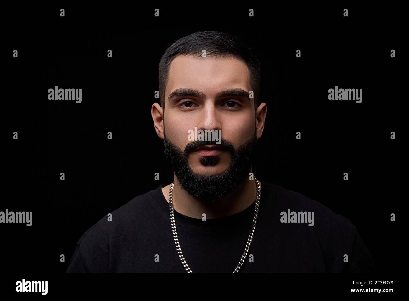 a close-up dramatic portrait of a young serious guy Stock Photo - Alamy